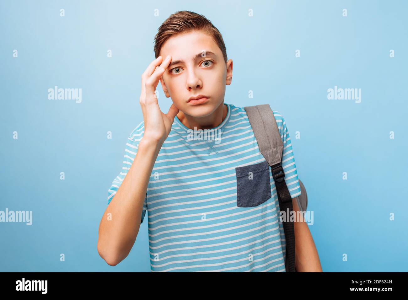 Surprised teenage boy, mouth wide open, stunned by shocking news, on ...