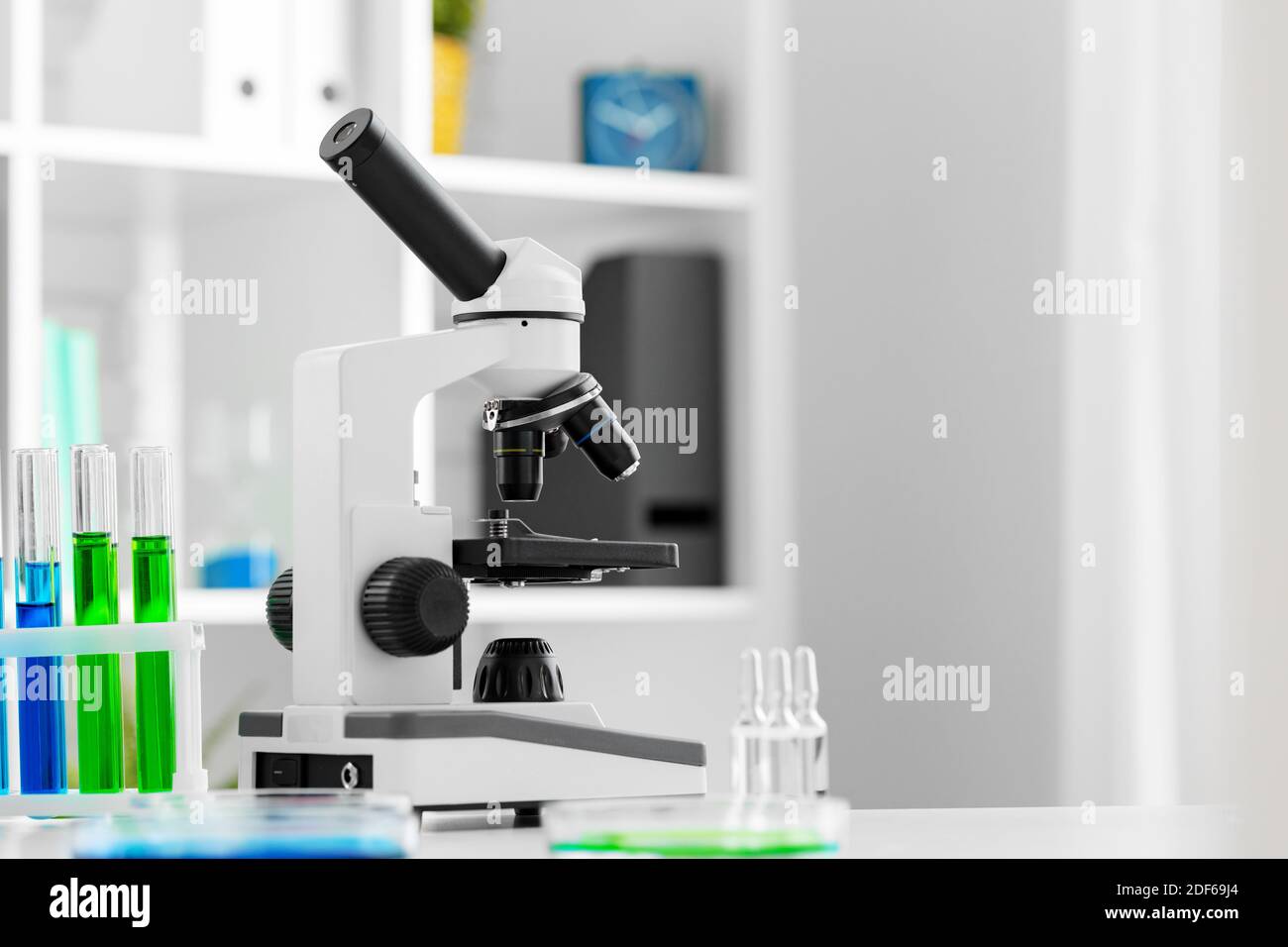 Scientific healthcare research background with microscope in medical ...