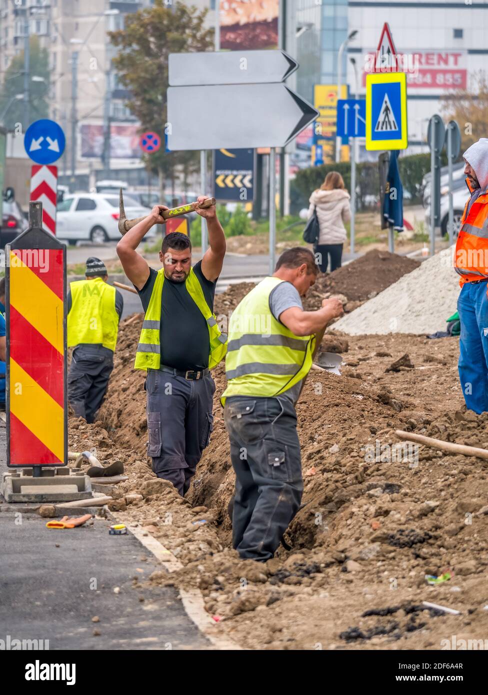 Bucharest construction workers hi-res stock photography and images - Alamy