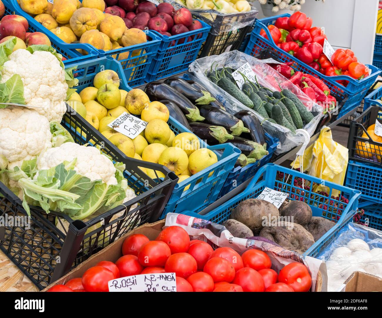 Fresh fruits and vegetables on display in a market in Bucharest. with ...
