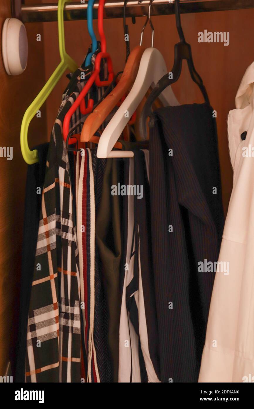 Clothes on the hanger, in the closet, fashion Stock Photo - Alamy