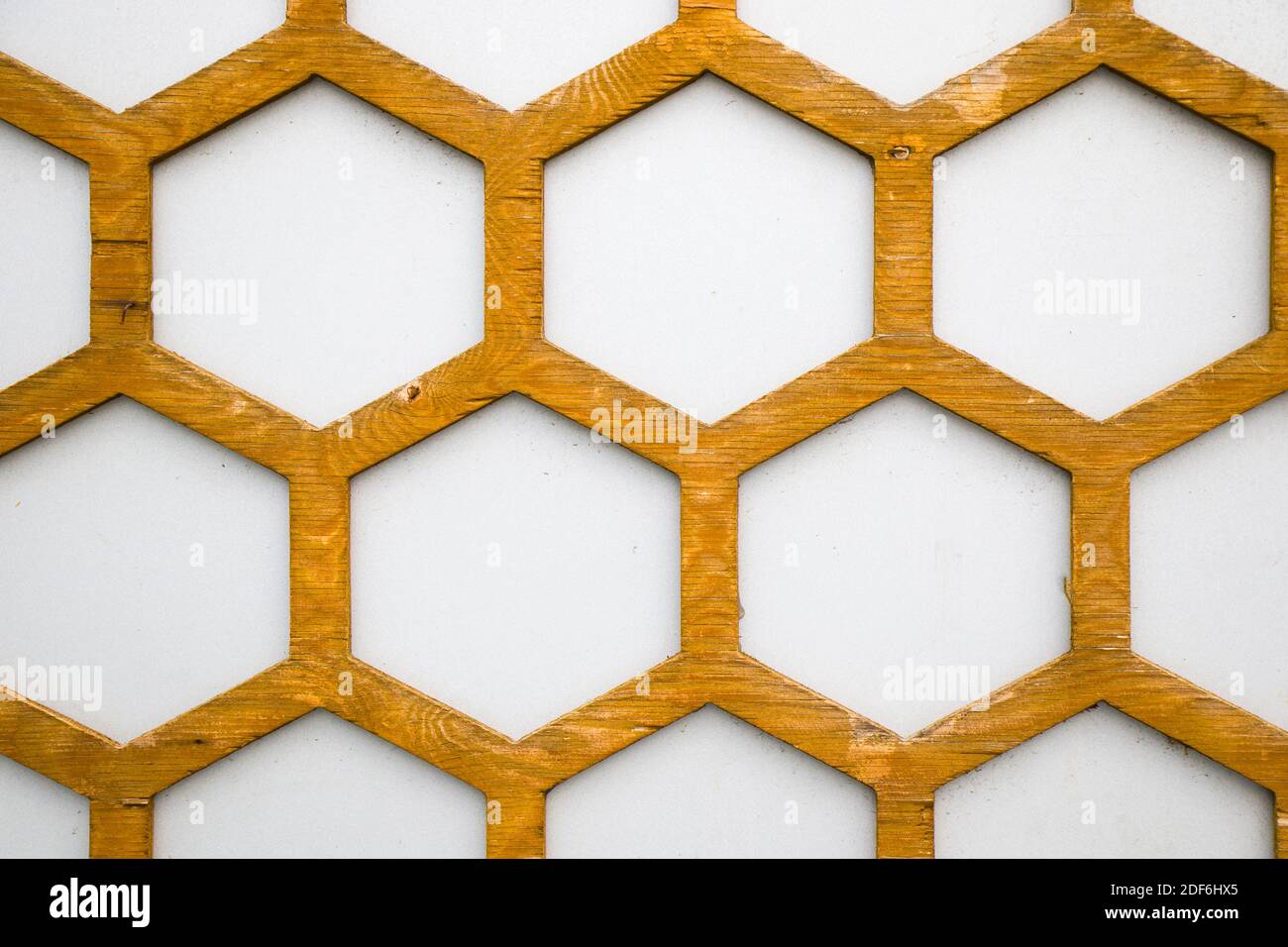 Honeycomb background, wooden comb and white wall texture Stock Photo ...