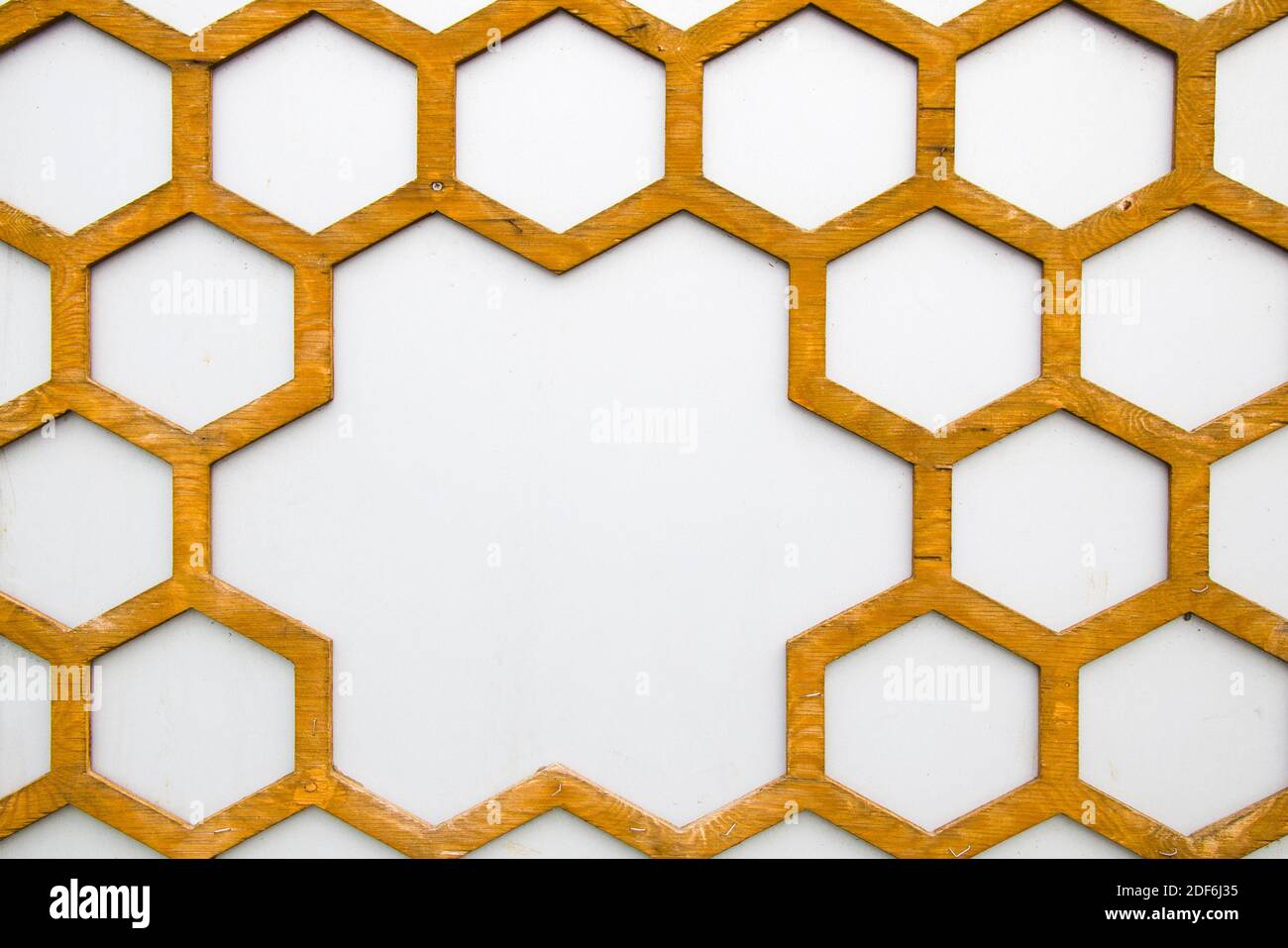 Honeycomb background, wooden comb and white wall texture Stock Photo ...