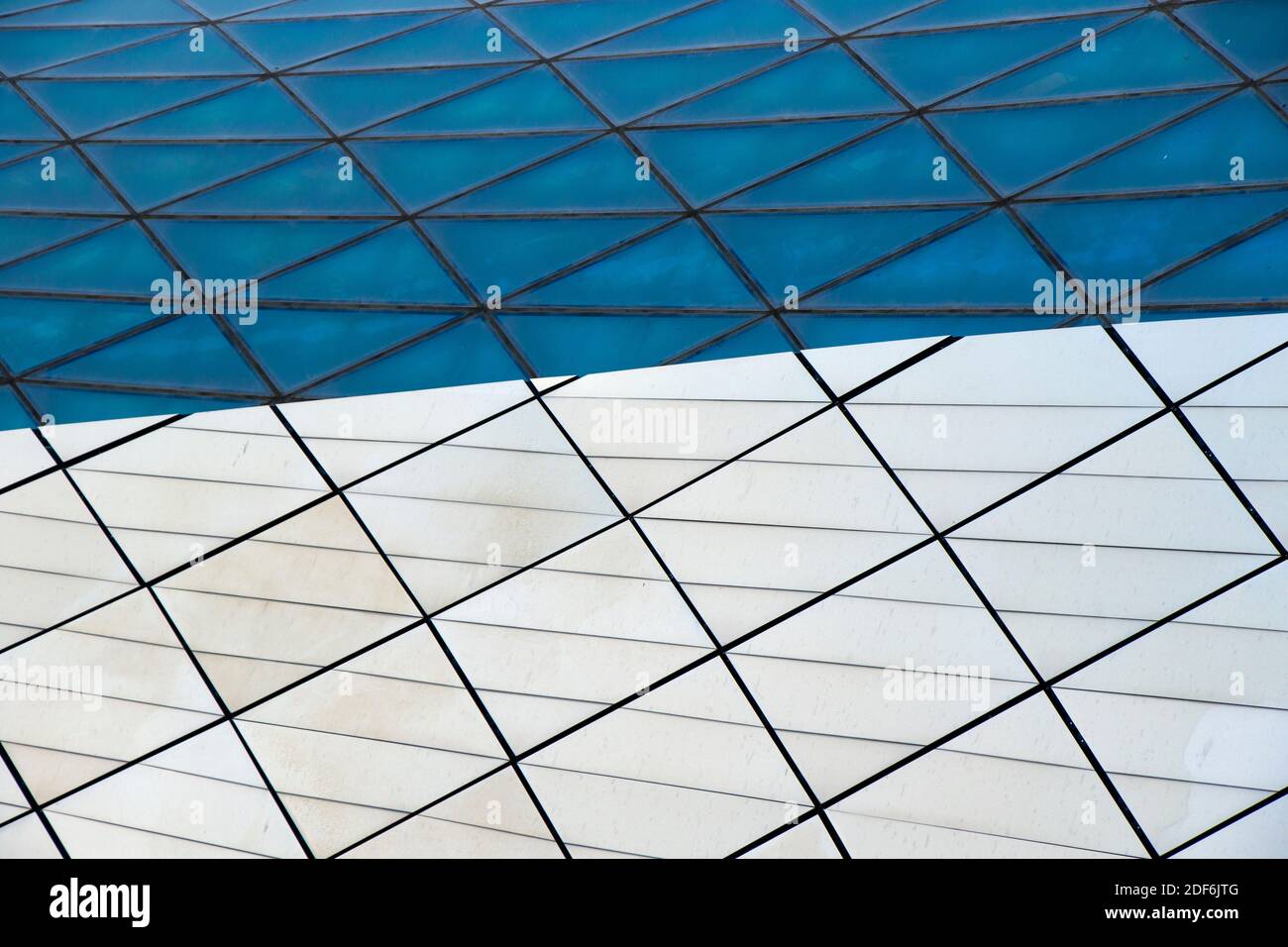 Metal and glass background, building exterior texture at sunset ...