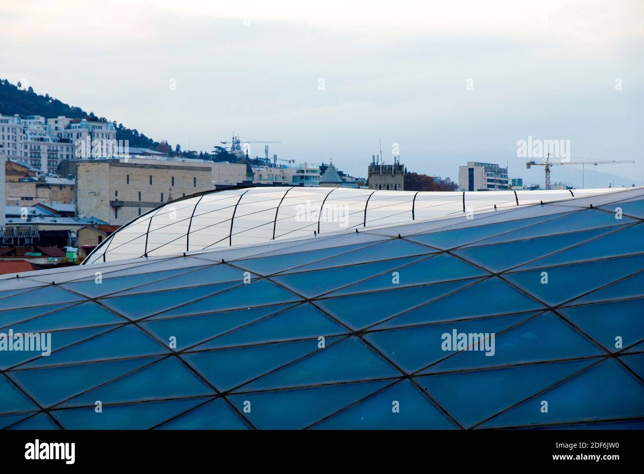 Metal and glass background, building exterior texture at sunset ...