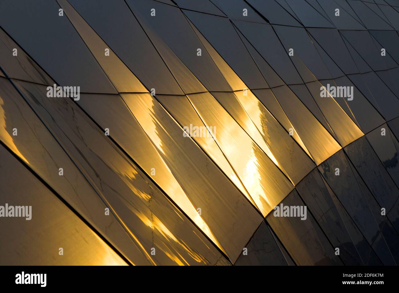 Metal and glass background, building exterior texture at sunset ...