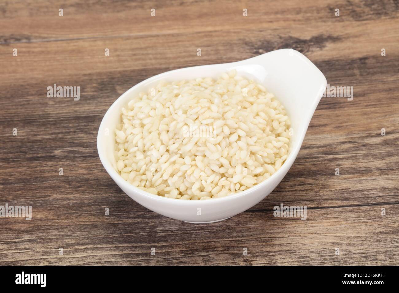 Raw Arborio rice for Italian risotto Stock Photo - Alamy