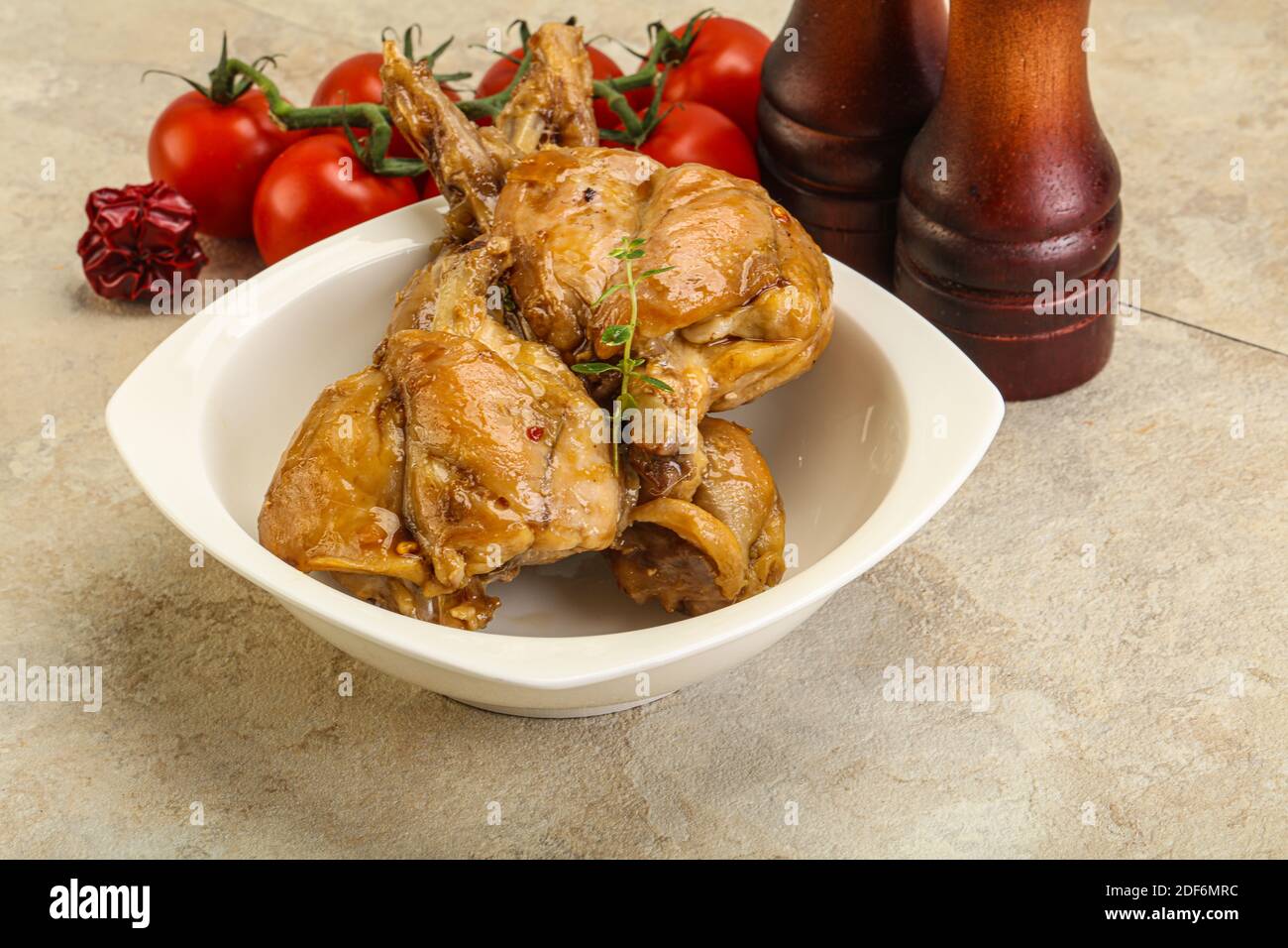 Rabbit stew in sweet and spicy sauce Stock Photo - Alamy