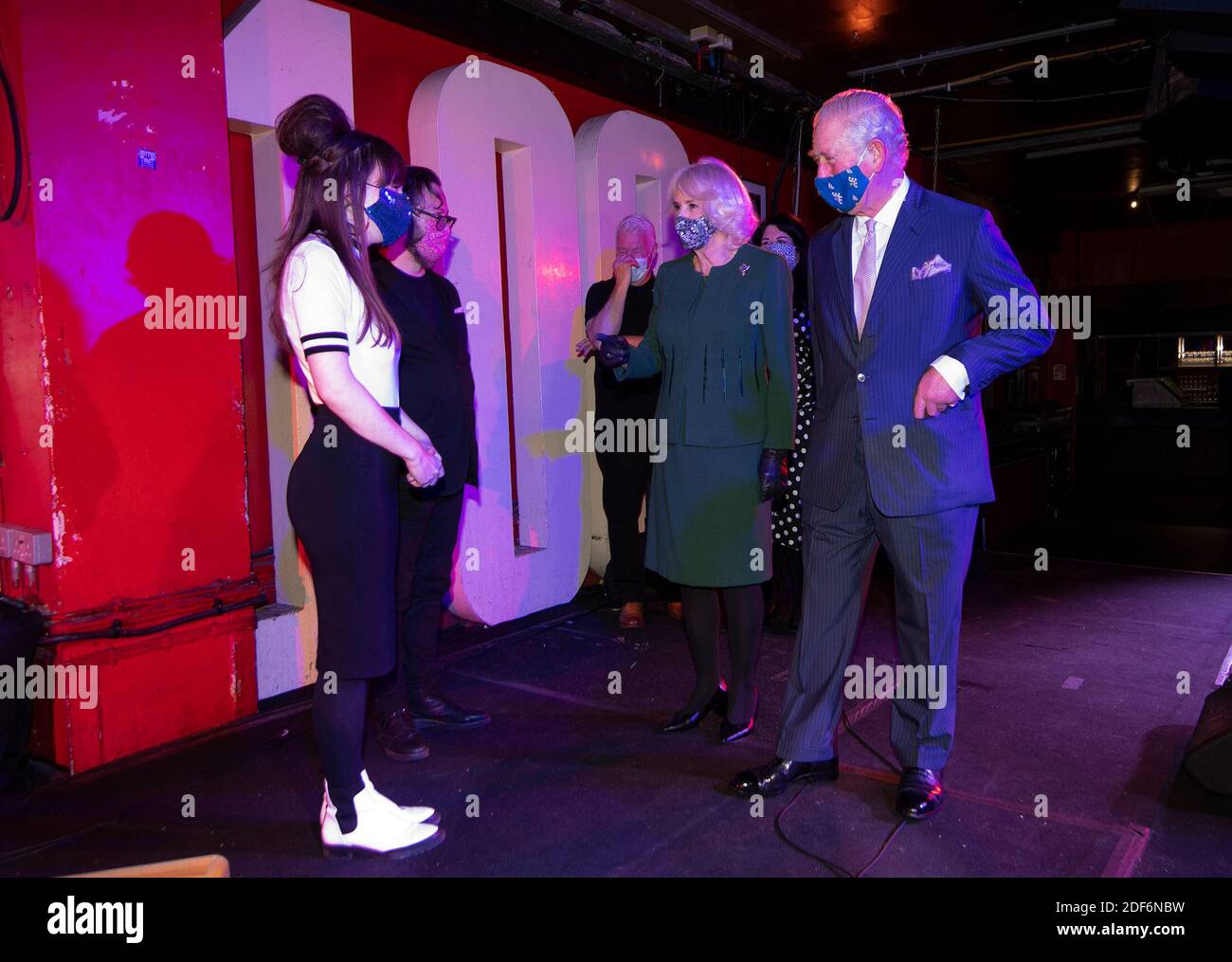 The Prince of Wales and Duchess of Cornwall talking to singer Emily ...