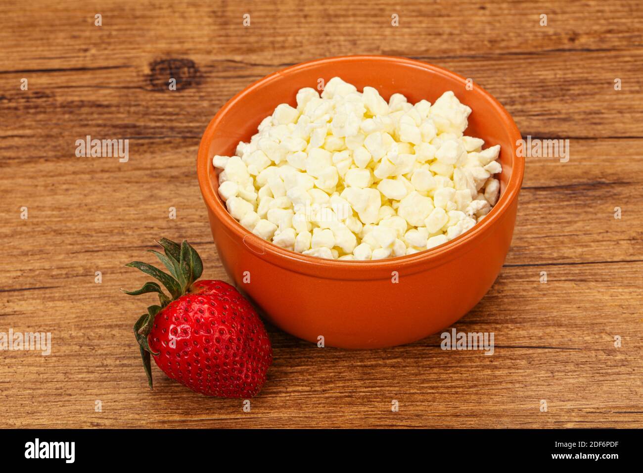 Dietary food - grain cottage cheese in the bowl Stock Photo - Alamy