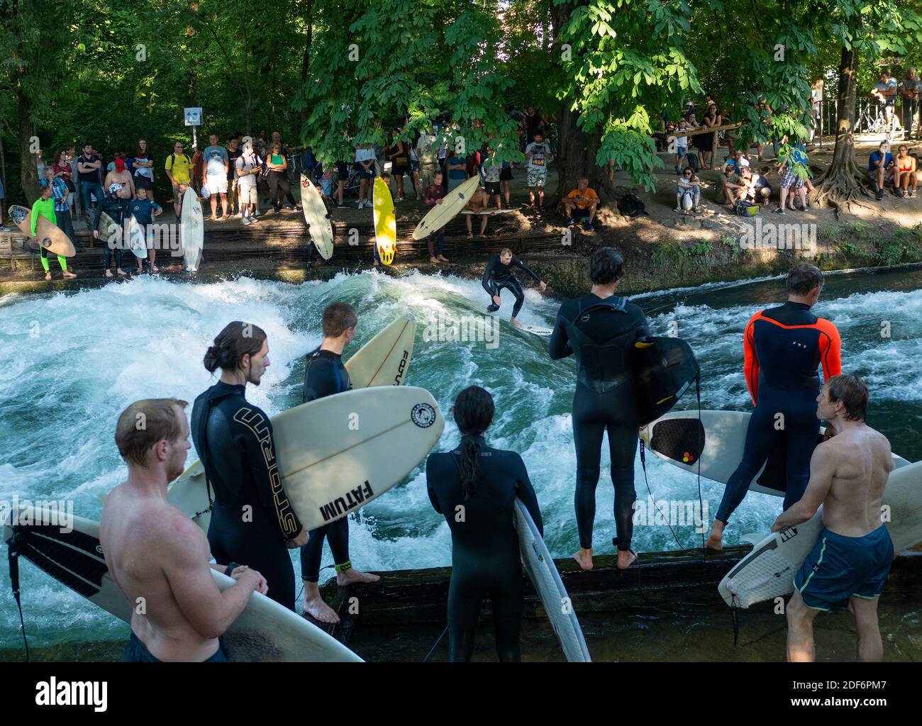 River Surfing at the Eisbach in Munich, Bavaria, Germany. The Eisbach ...
