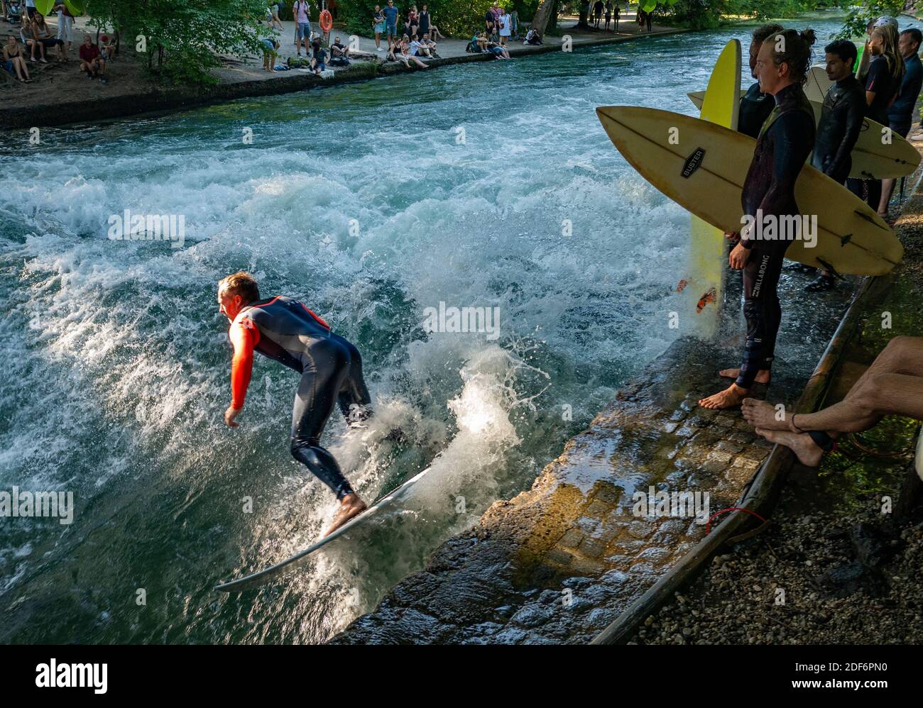 River Surfing at the Eisbach in Munich, Bavaria, Germany. The Eisbach ...