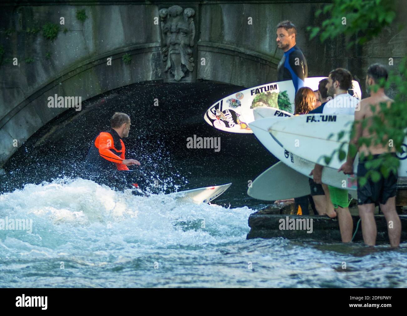 River Surfing at the Eisbach in Munich, Bavaria, Germany. The Eisbach ...
