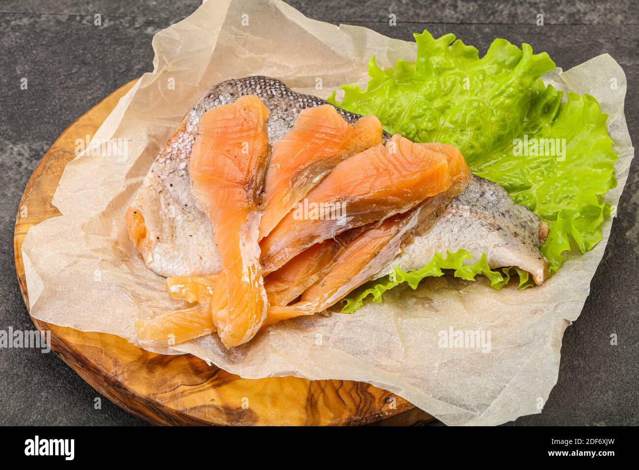 Sliced natural wild trout fillet over board Stock Photo - Alamy