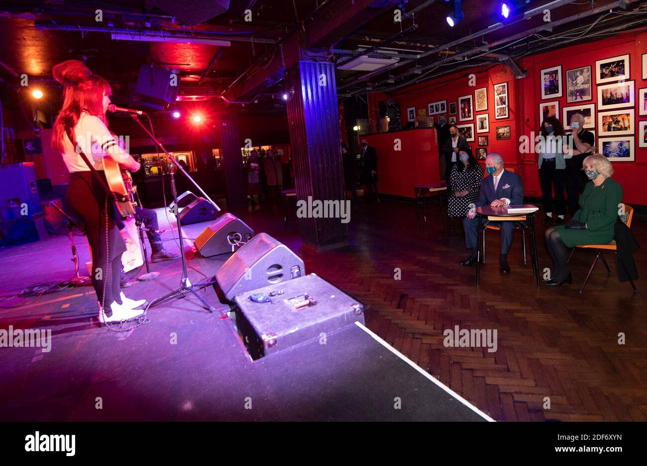 The Prince of Wales and Duchess of Cornwall watching a short musical ...