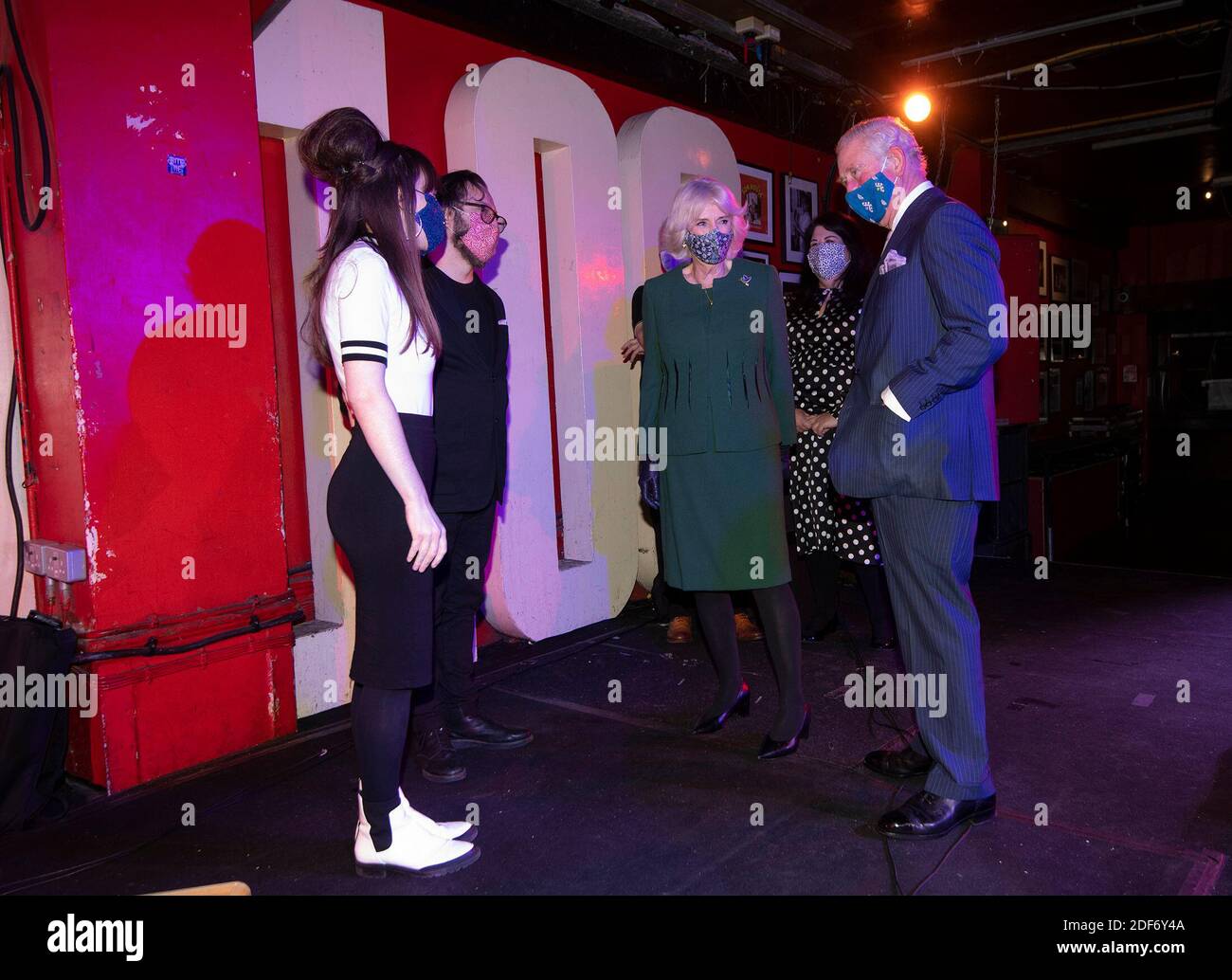 The Prince of Wales and Duchess of Cornwall talking to singer Emily ...