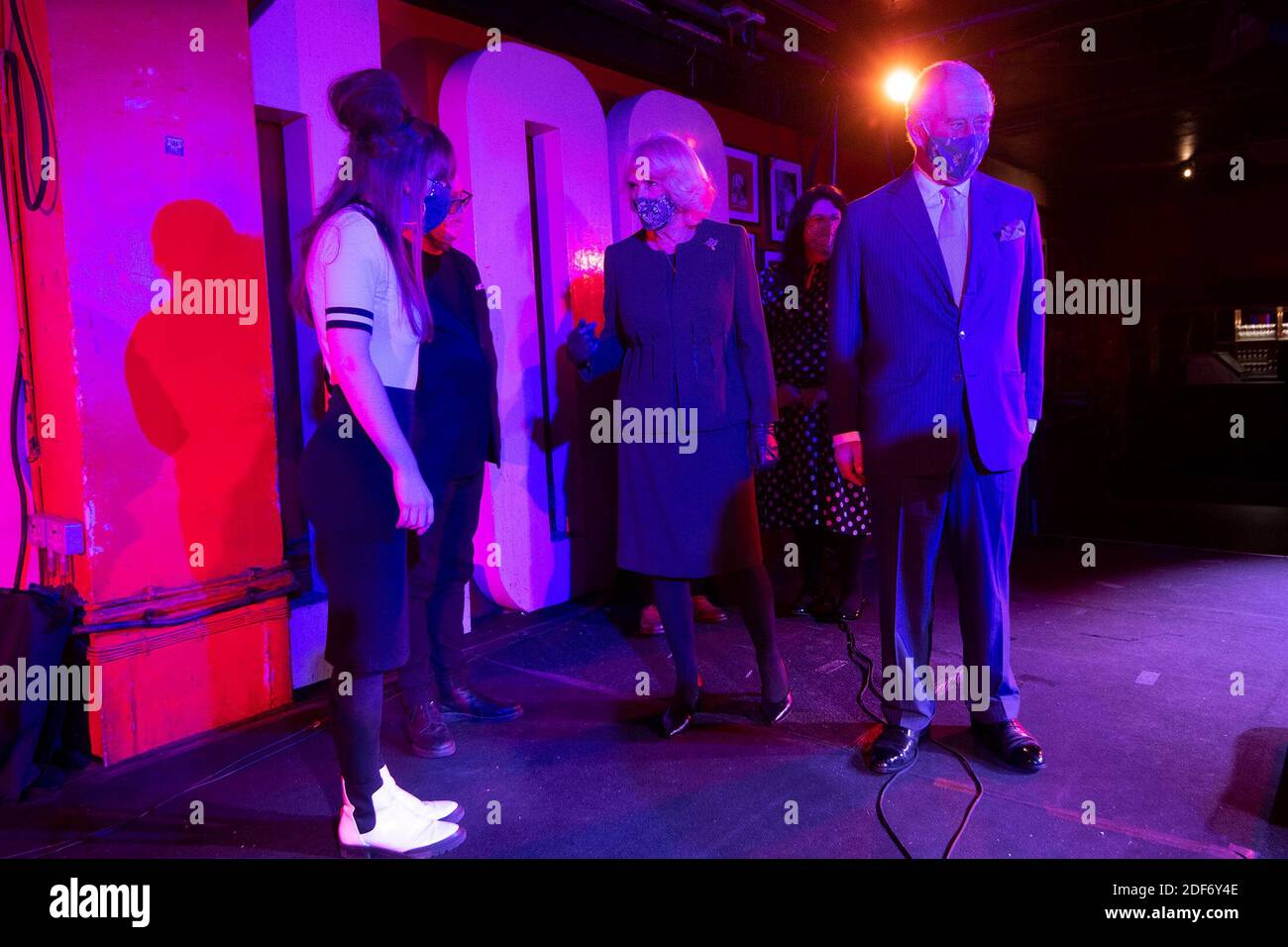 The Prince of Wales and Duchess of Cornwall talking to singer Emily ...