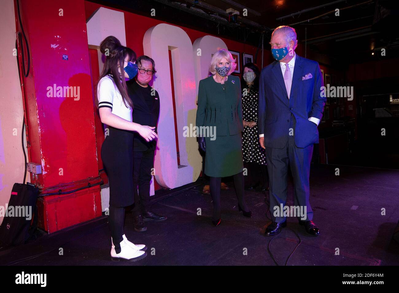 The Prince of Wales and Duchess of Cornwall talking to singer Emily ...