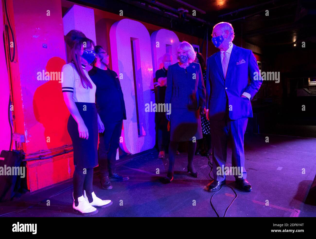 The Prince of Wales and Duchess of Cornwall talking to singer Emily ...