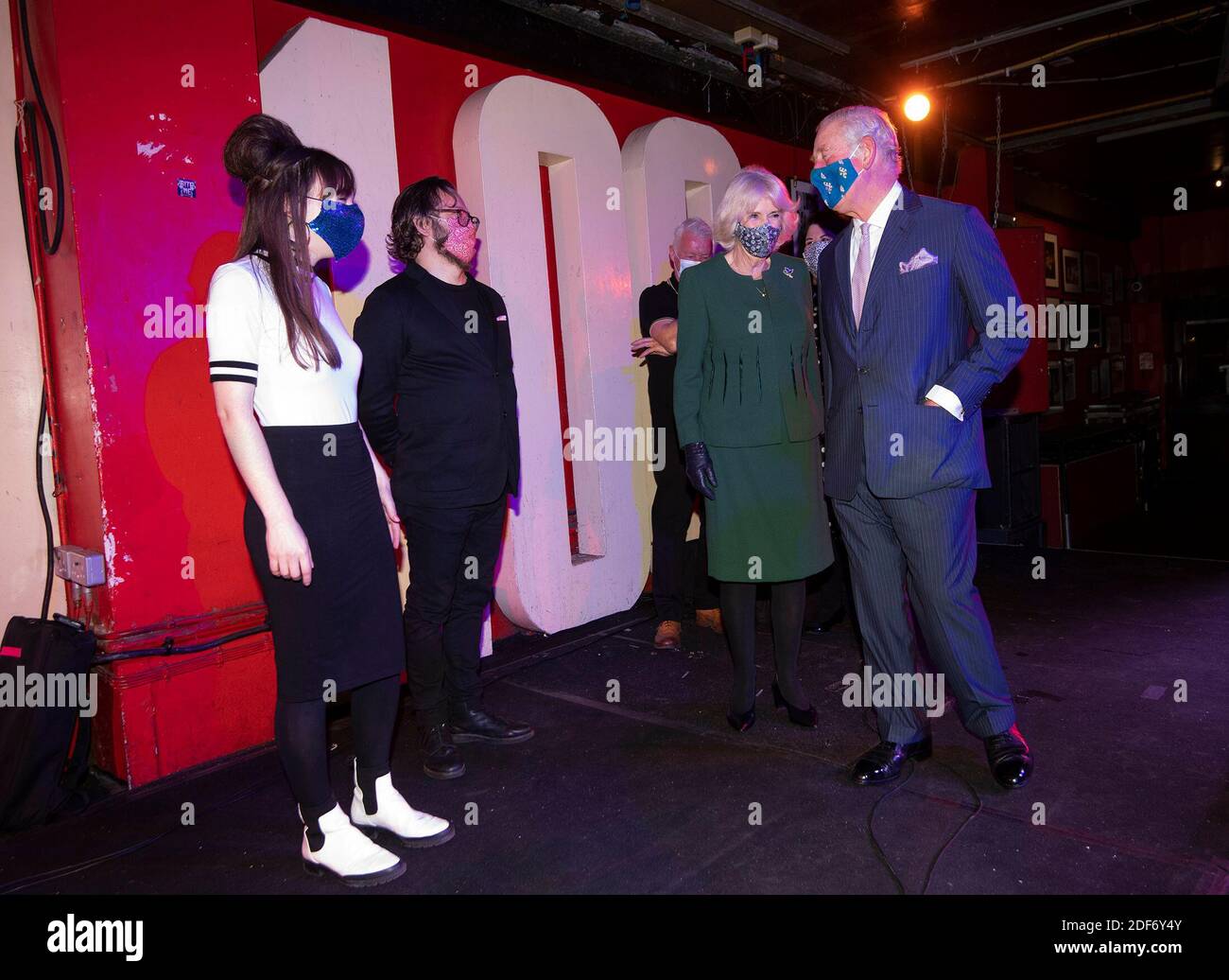 The Prince of Wales and Duchess of Cornwall talking to singer Emily ...