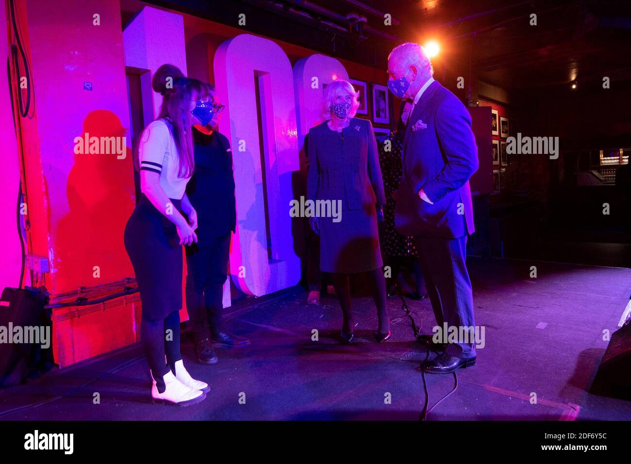 The Prince of Wales and Duchess of Cornwall talking to singer Emily ...
