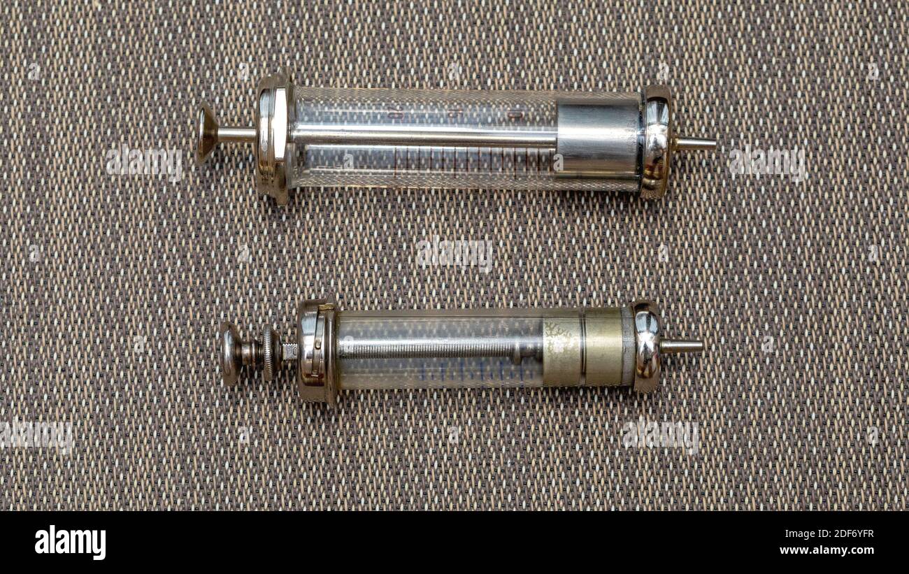 Two Big Old Reusable Glass Syringes Devices Stock Photo - Alamy