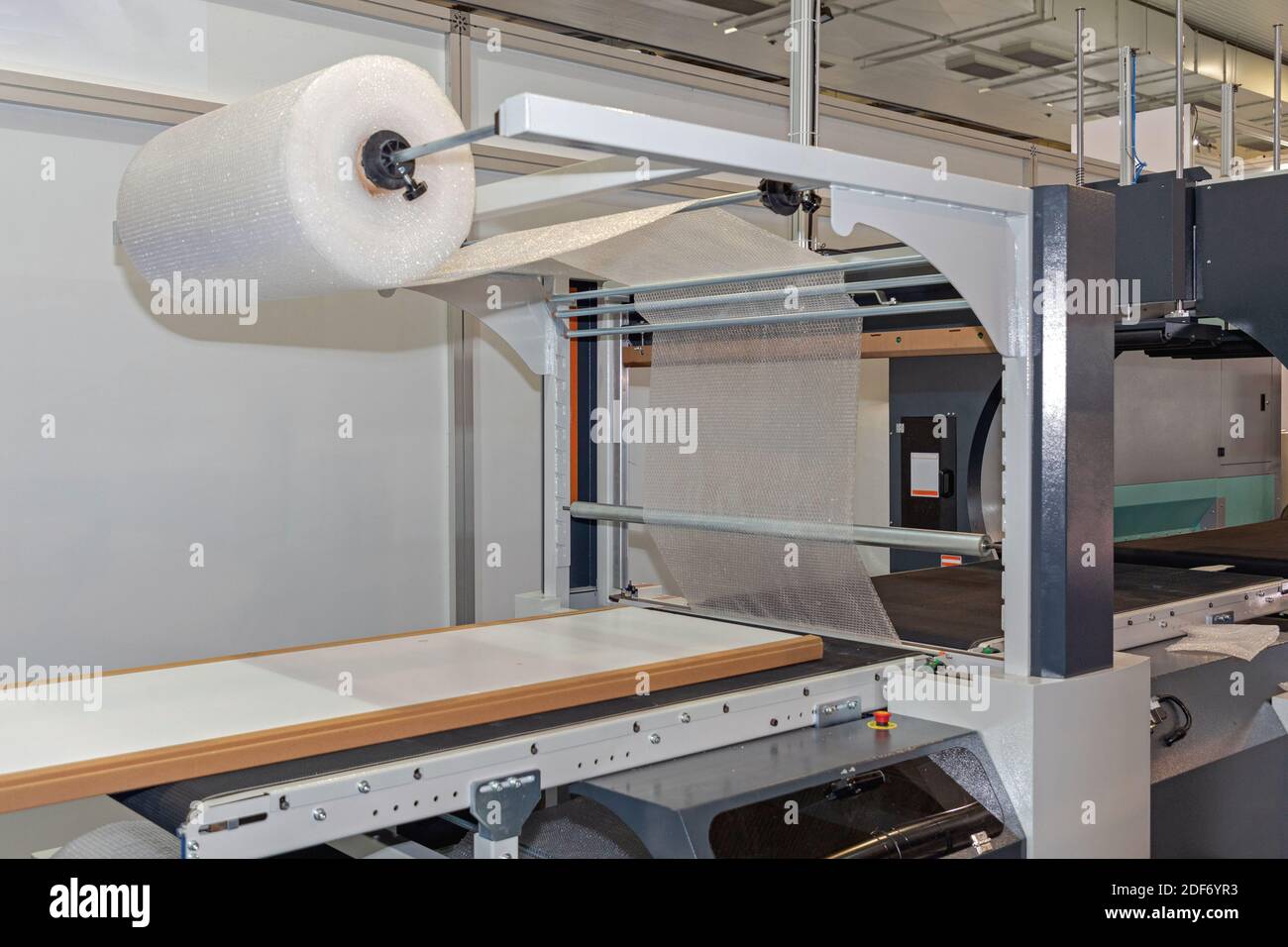 Automated Cabinet Packing Wrapping Machine in Furniture Factory Stock ...