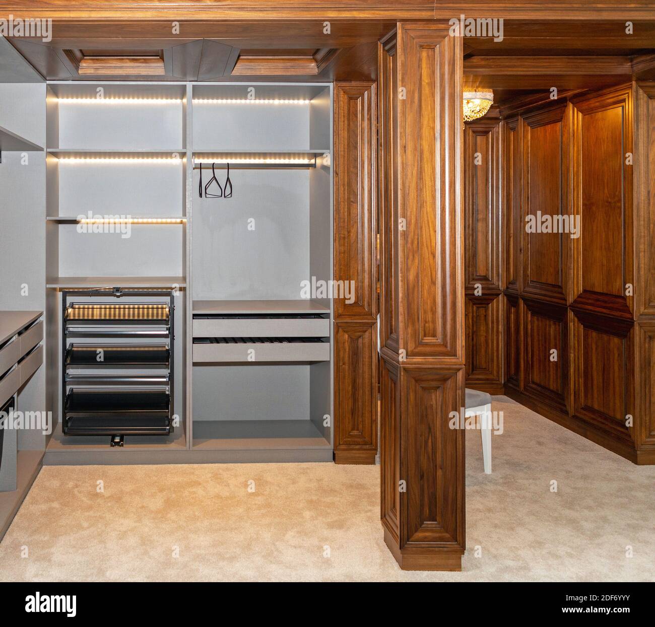 Empty Walk in Wardrobe Closet With Lights Stock Photo - Alamy