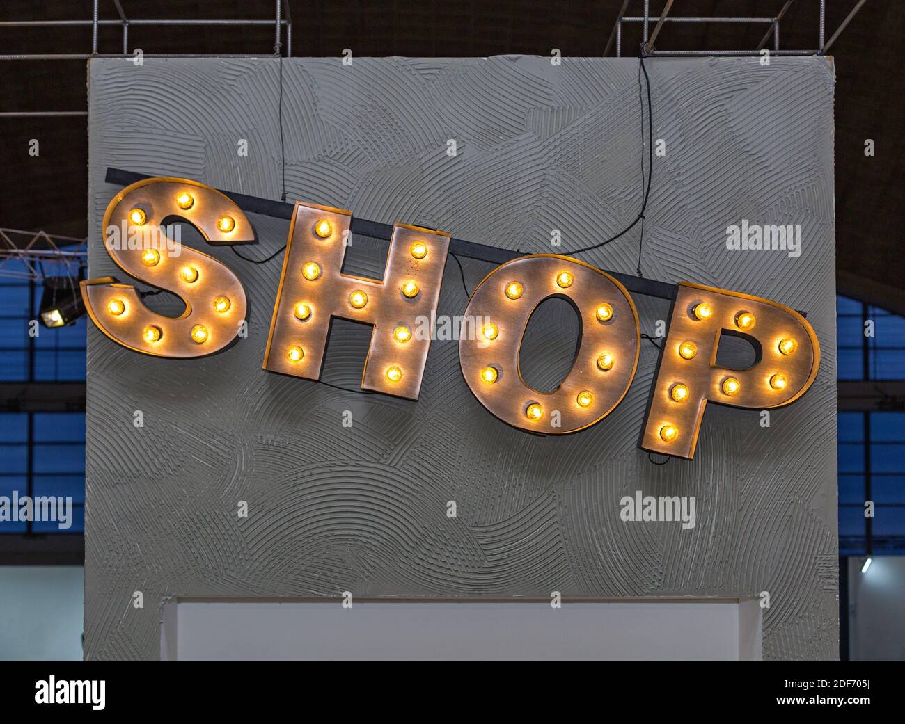 Big Shop Sign With Lightbulbs Turn On Stock Photo - Alamy