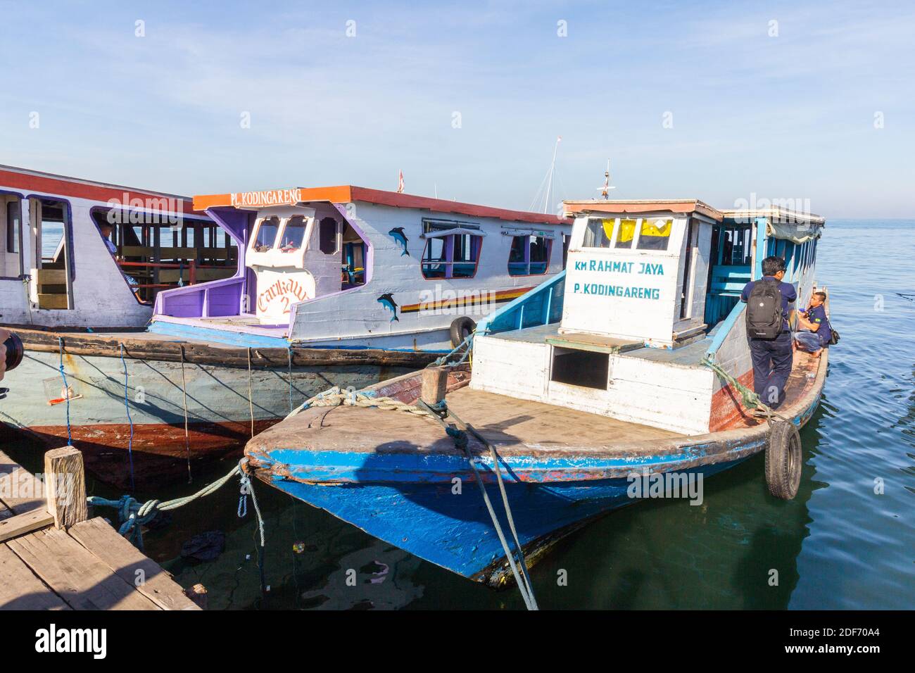 Passenger boats at the ferry terminal in Makassar, Sulawesi, Indonesia ...