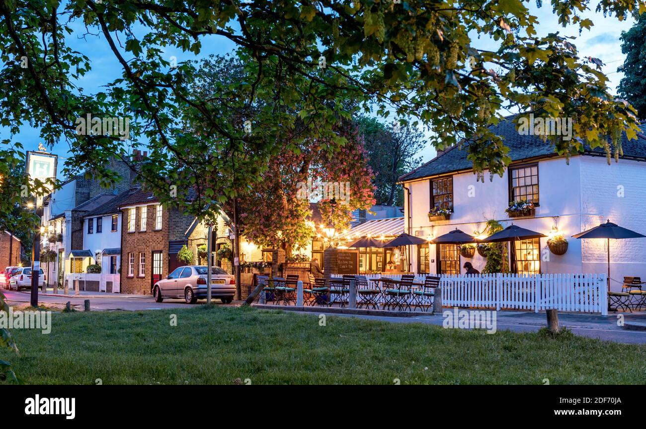 The Hand In Hand Pub on Wimbledon Common at Night London UK Stock Photo ...