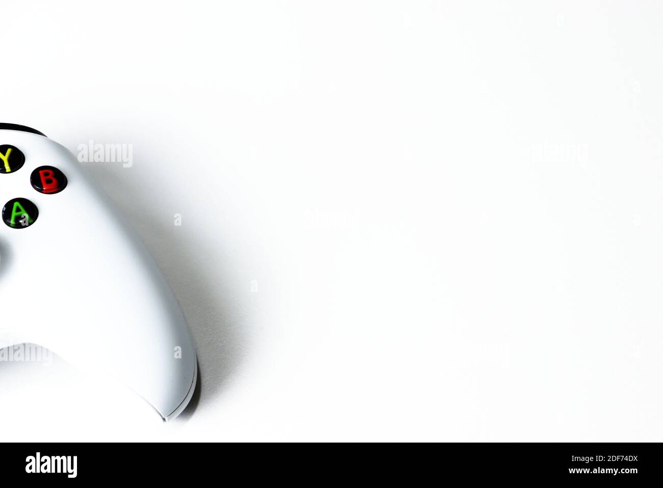 White Game controller on a white background - console wireless ...