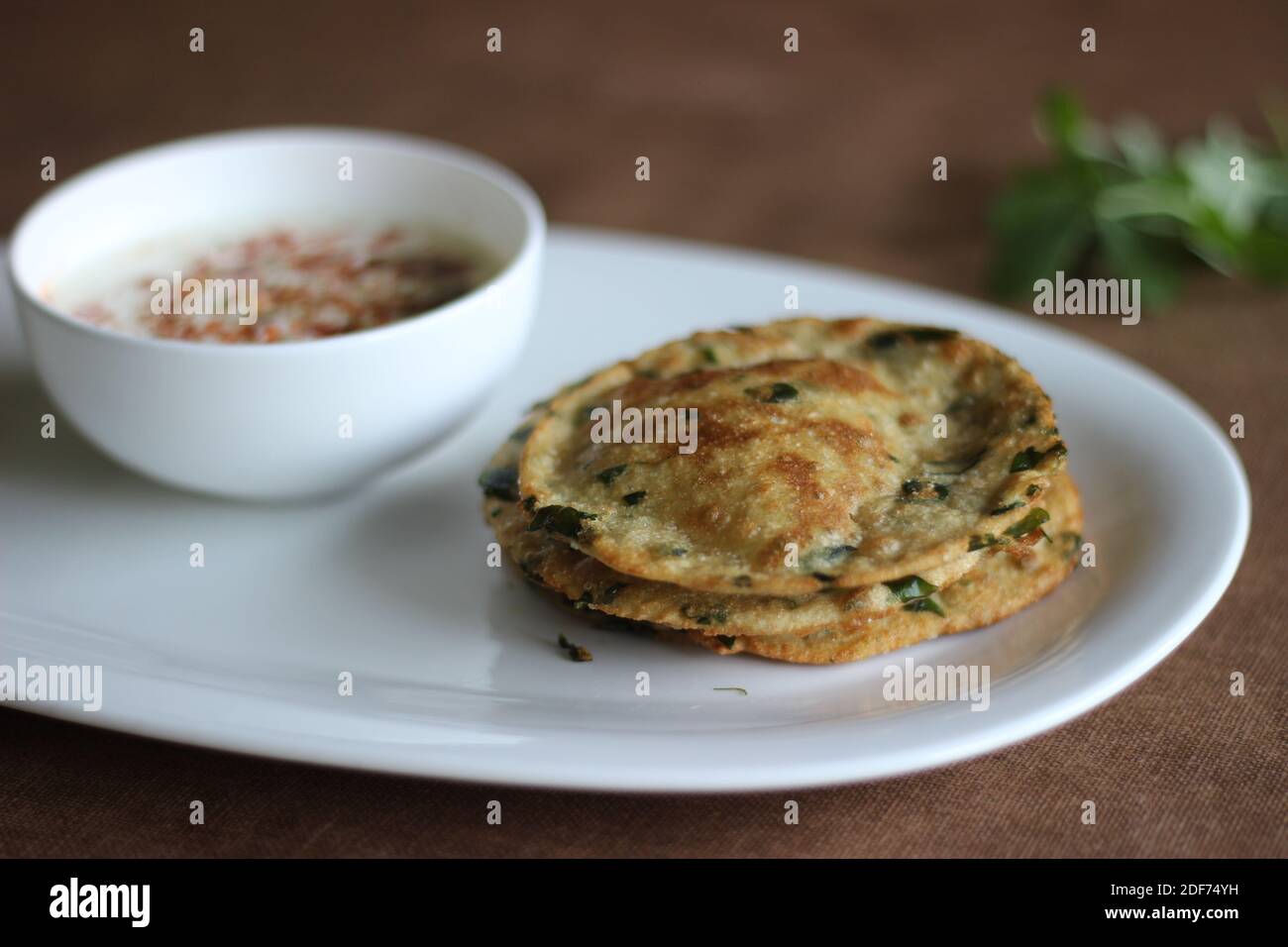A healthy Indian flatbread called Methi poori made of whole wheat flour ...