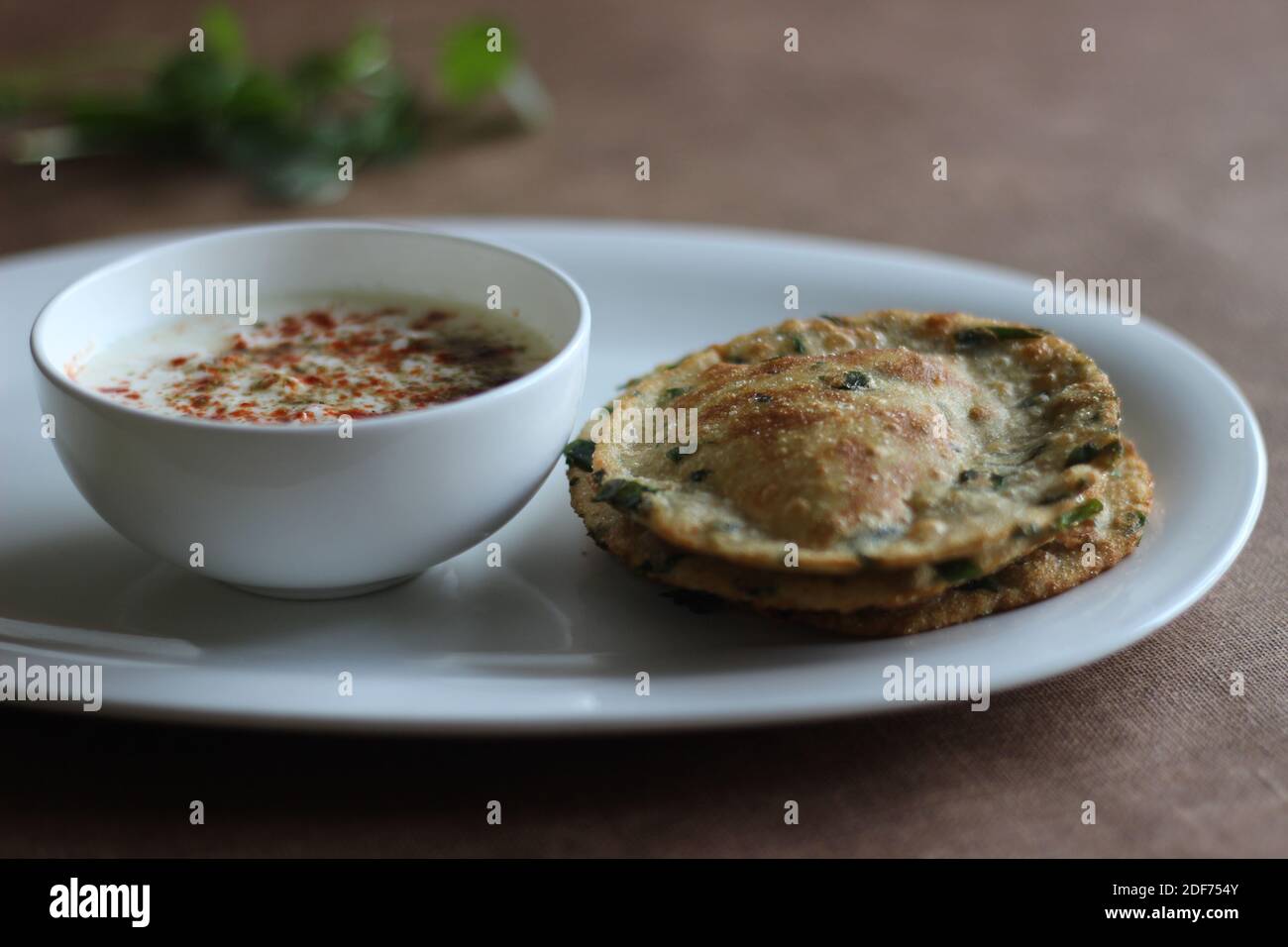 A healthy Indian flatbread called Methi poori made of whole wheat flour ...