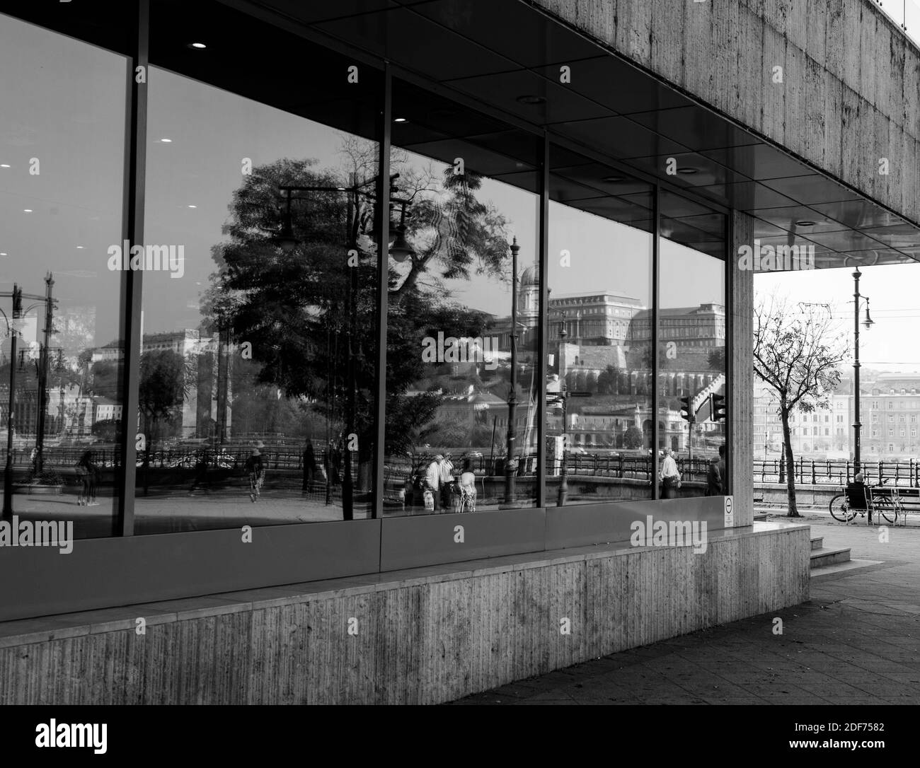 Reflections of buildings in a window Black and White Stock Photos ...