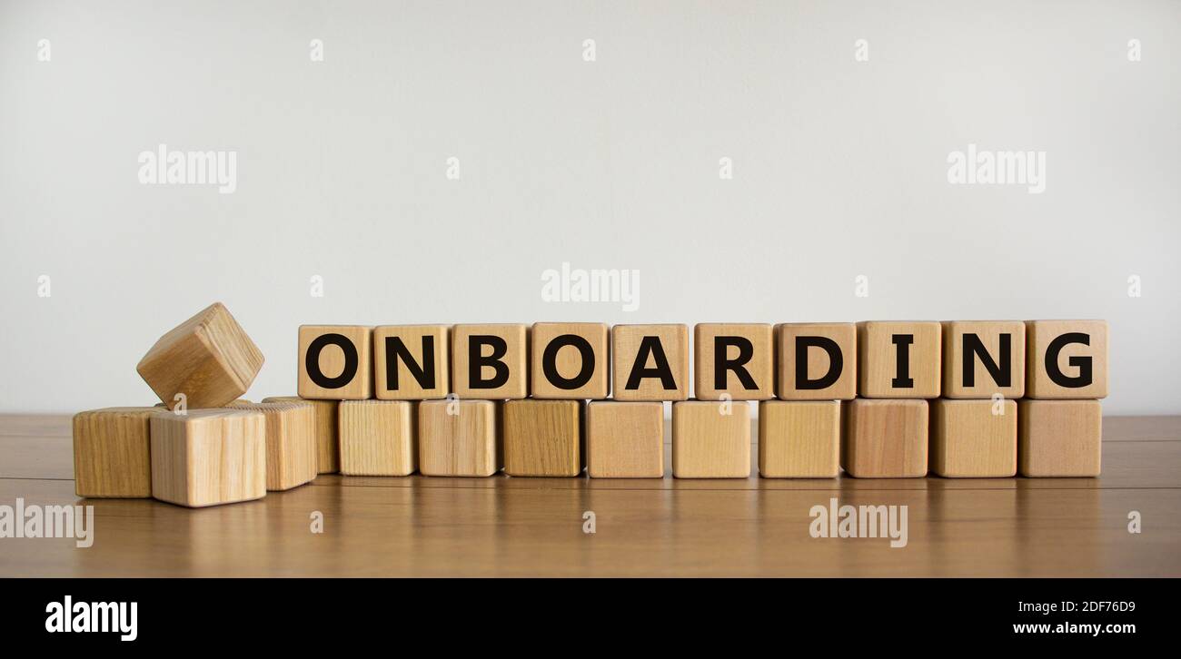 Onboarding symbol. 'Onboarding' written on wooden blocks. Business and ...