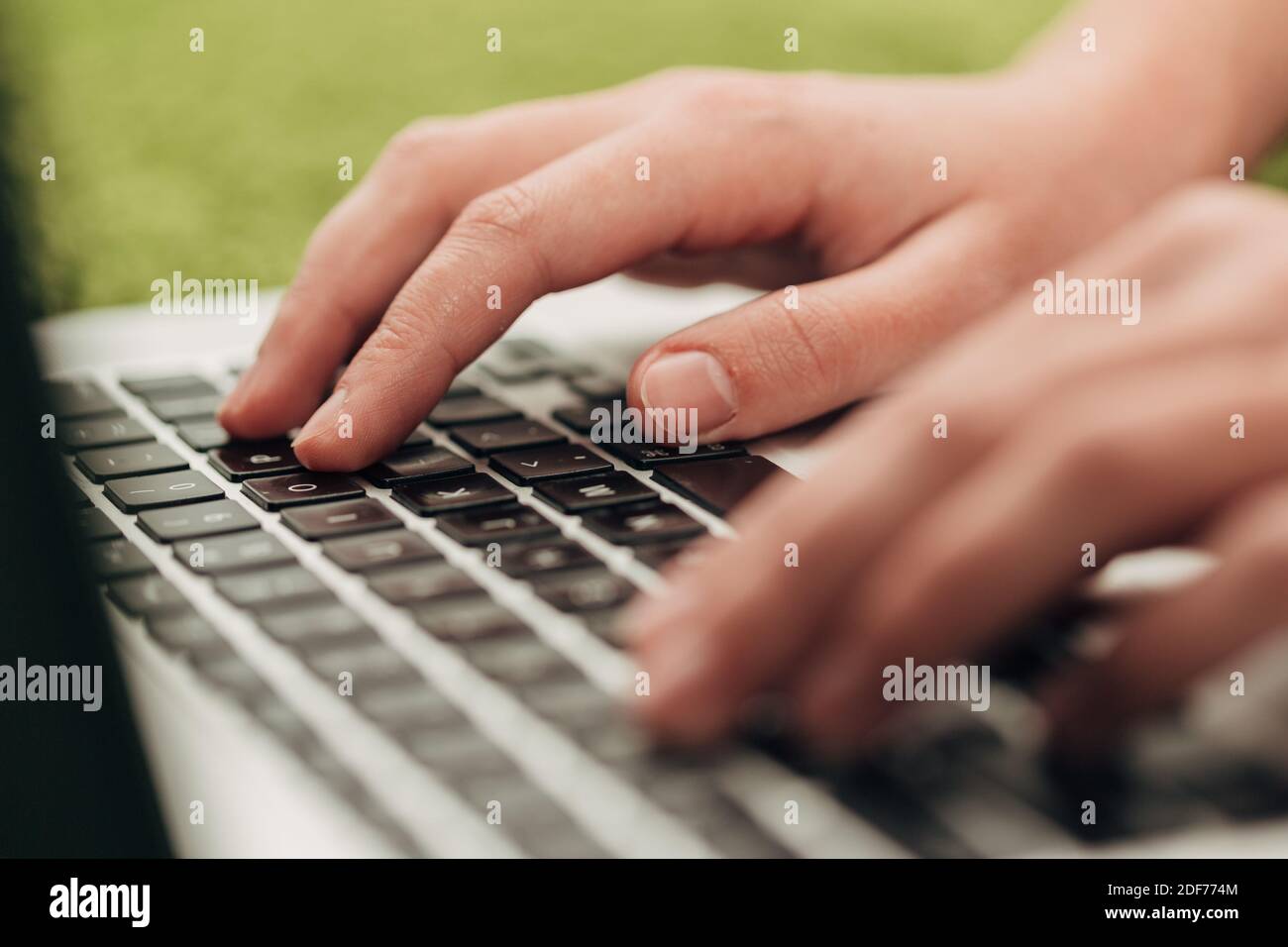 Close-Up Shot of Human Hands Placed Over Laptop Stock Photo - Alamy