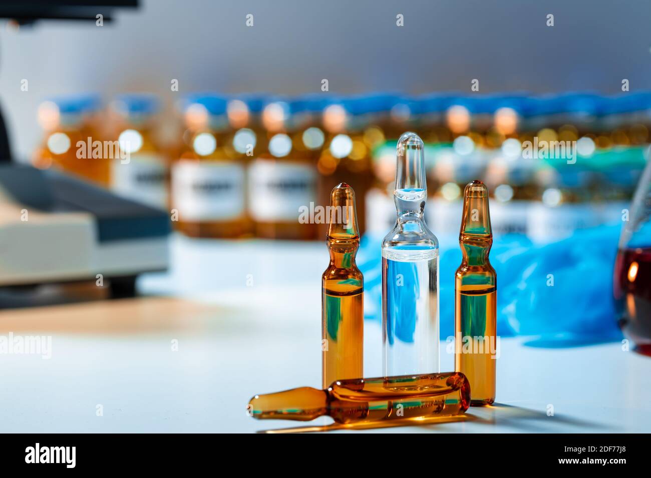 Plain ampule vials for injections close up Stock Photo - Alamy