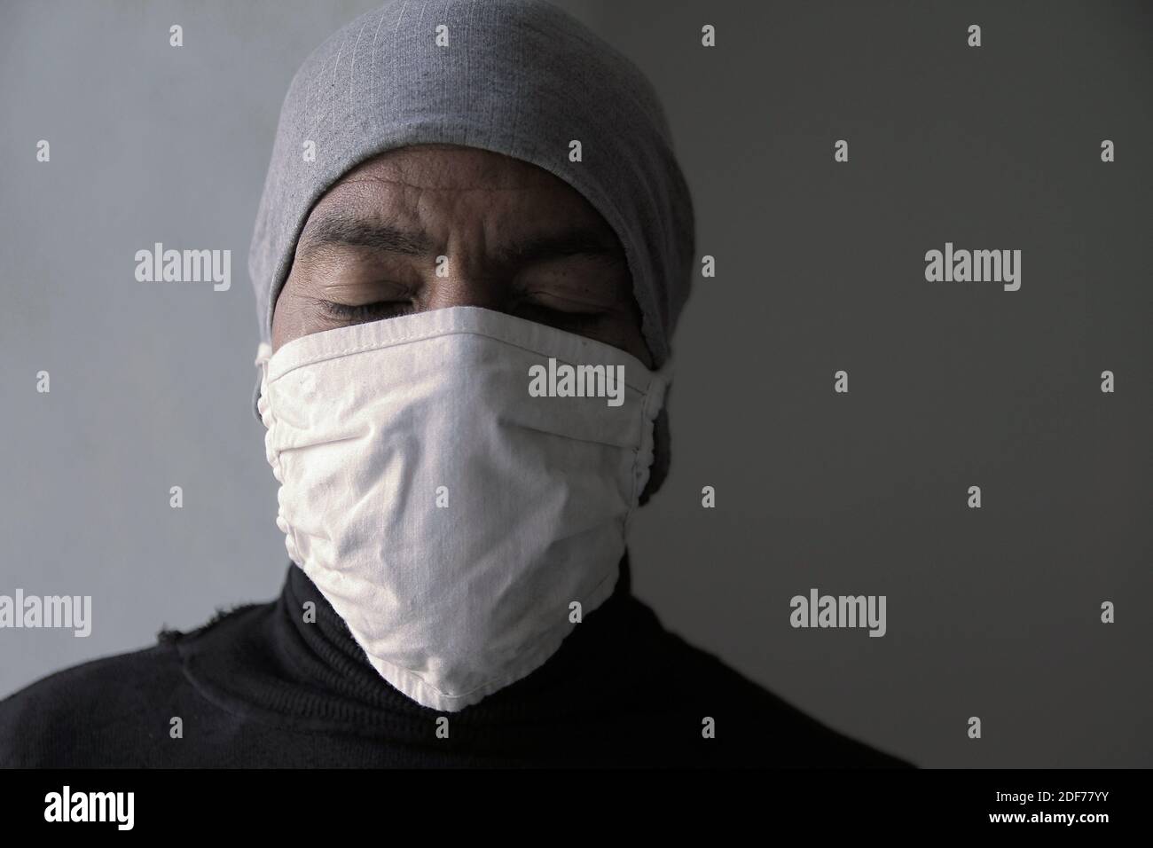 men with face masks fighting the coronavirus stock photo Stock Photo ...