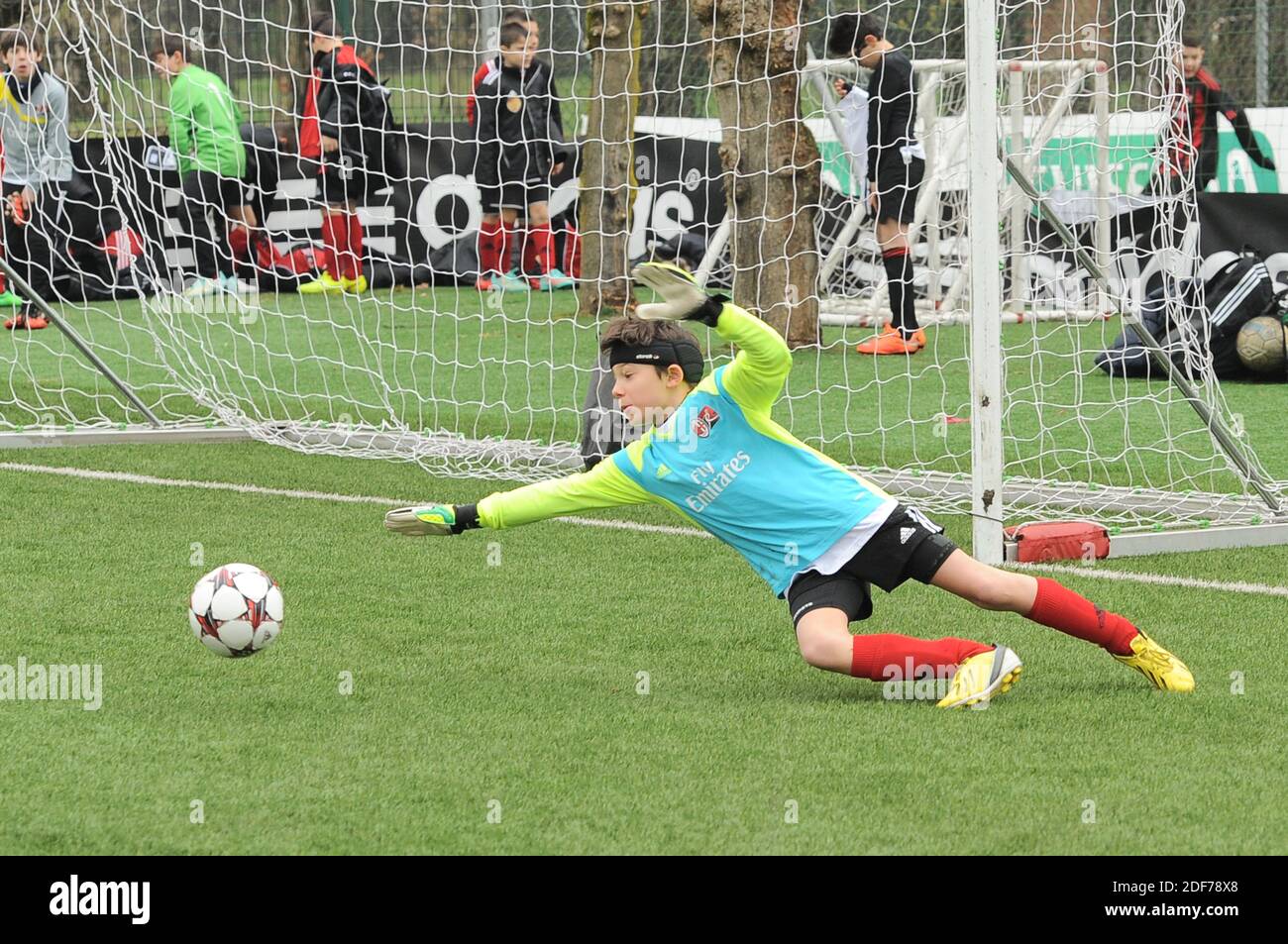 Kids' soccer, children play ball in football school Stock Photo - Alamy