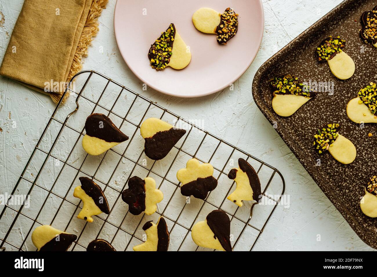 A closeup of cookies of different shapes on a white background Stock ...