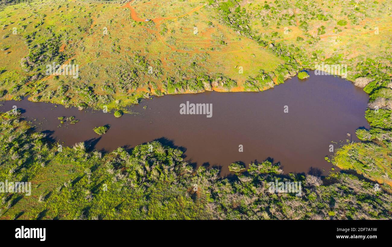 Aerial scenery over hills and lake above Caribbean Island of Curacao ...