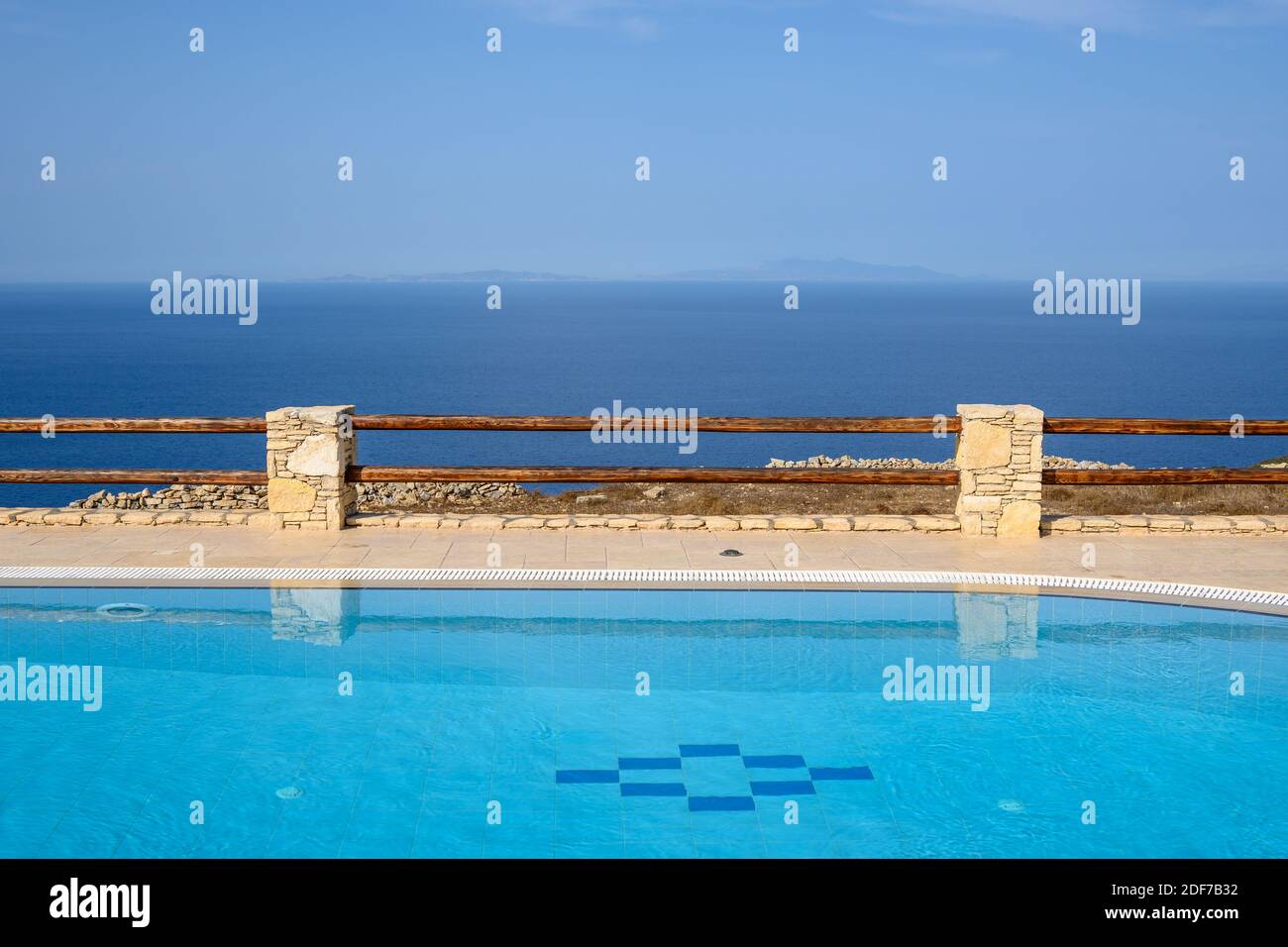 Holiday swimming pool overlooking the sea. Summer holiday concept Stock ...