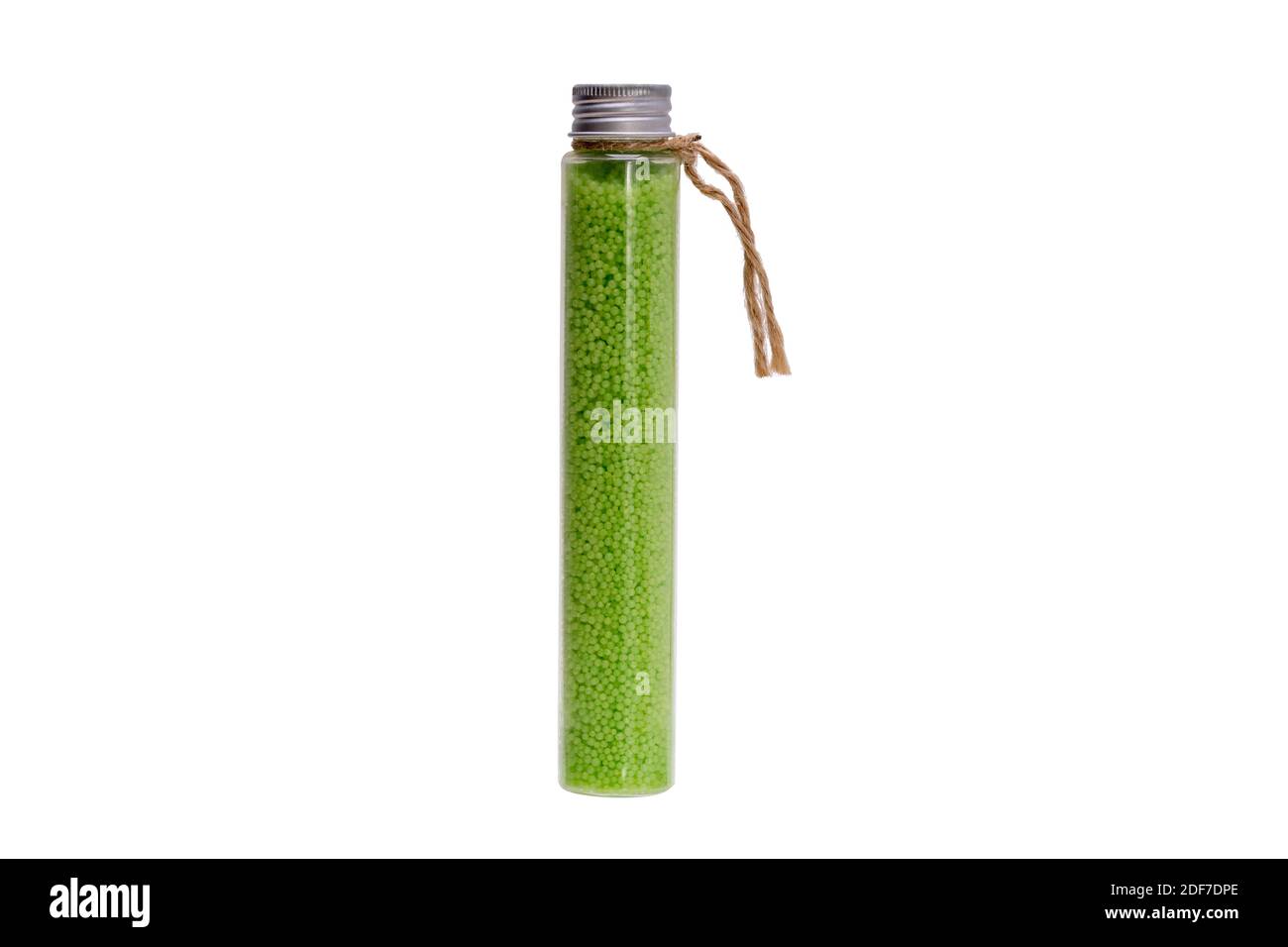 glass bottle with green granules isolated on white Stock Photo - Alamy