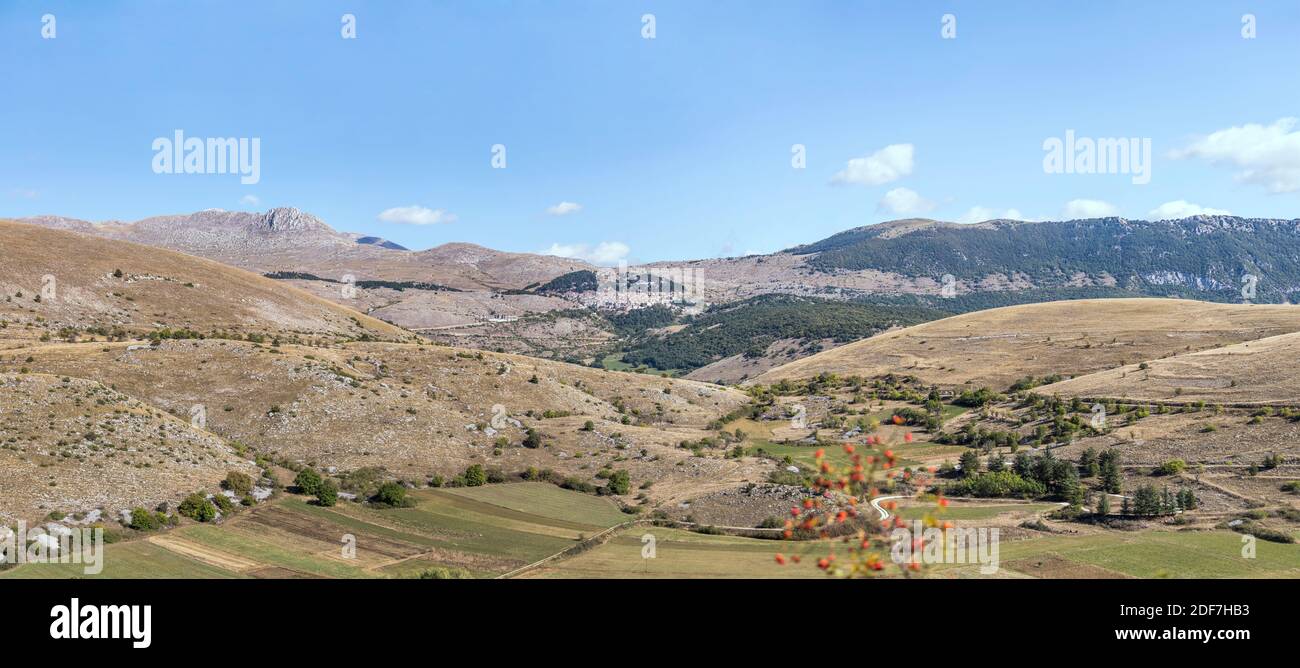 panoramic landscape with barren slopes of "Monti della Laga" and Castel ...