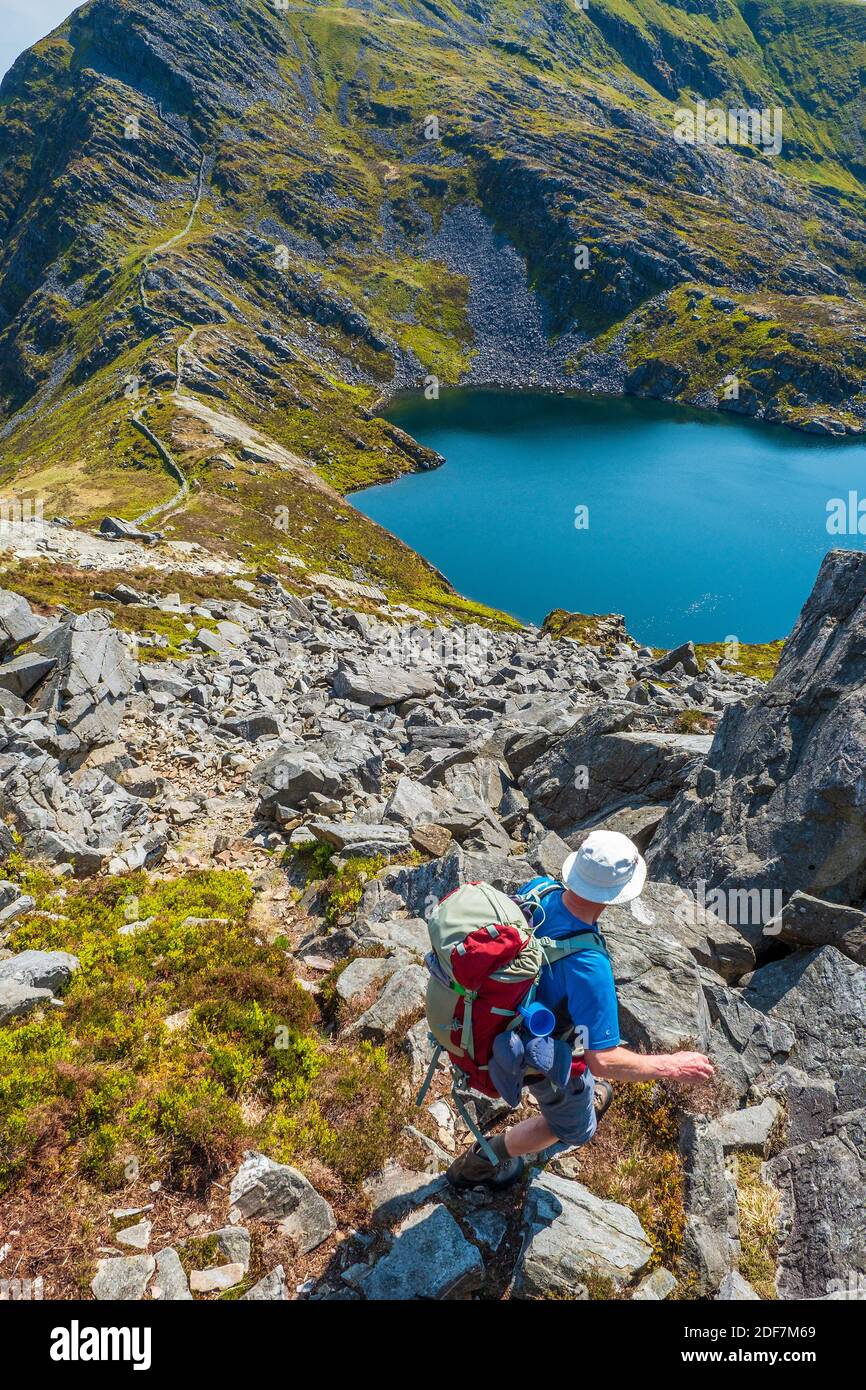 Male walker / backpacker in the Rhinogs, a remote range of hills in mid ...