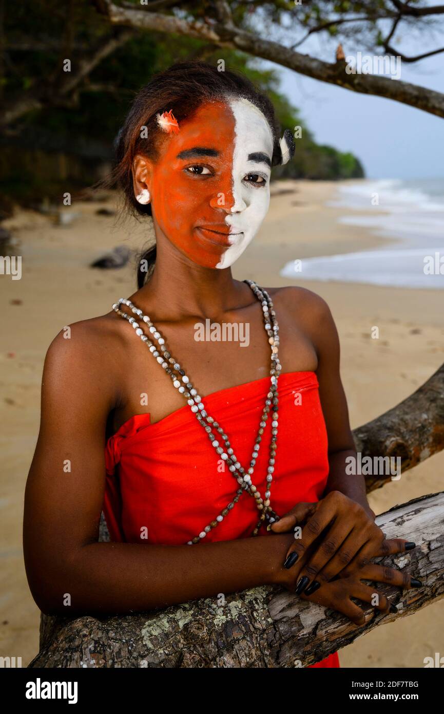 Gabon, Libreville, portrait of a woman with traditional makeup during ...