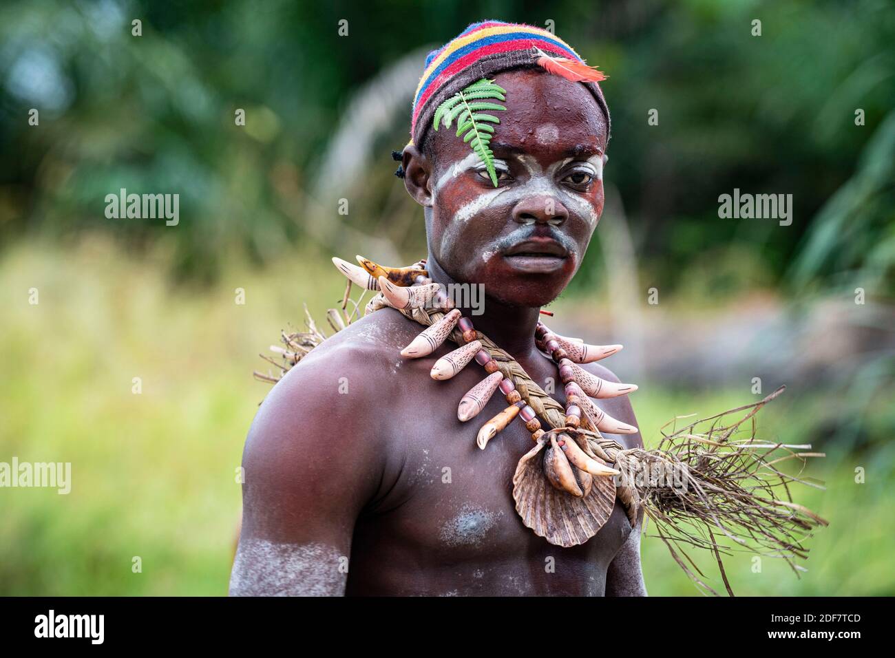 Gabon, Libreville, portrait of a man with traditional makeup during ...