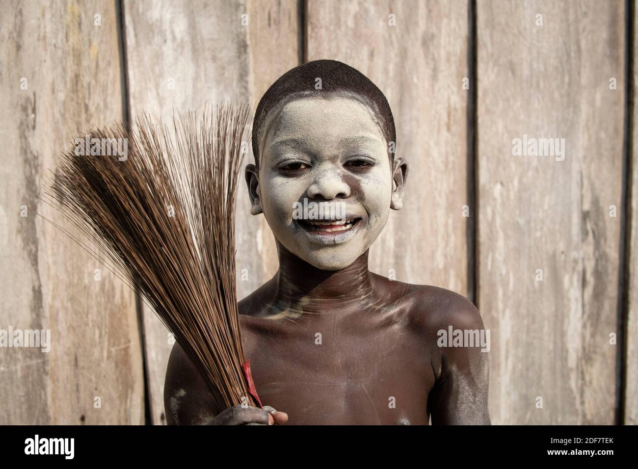 Gabon, Libreville, portrait of aboy with kaolin traditional makeup ...