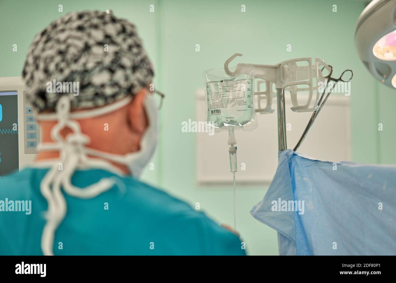 Surgeon Inserting Tube Into Patient During Surgery Stock Photo - Alamy